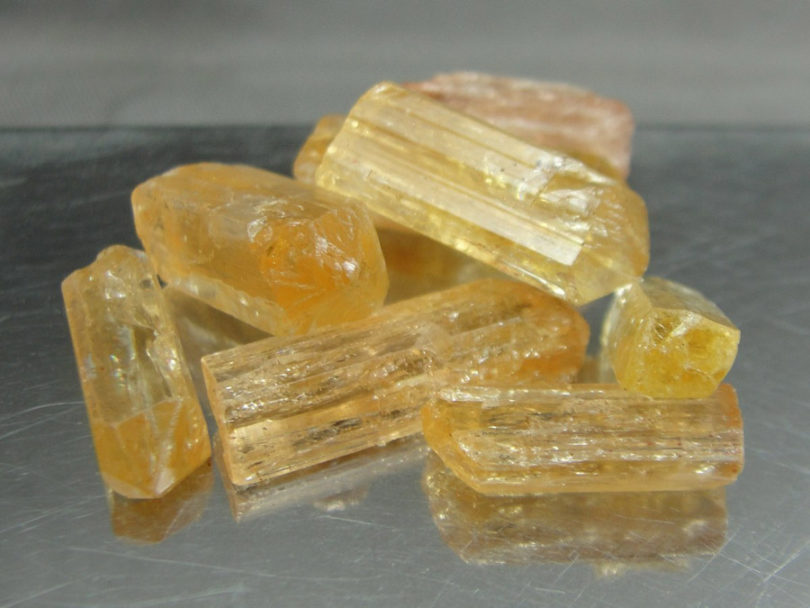 Topázio Imperial: propriedades e usos do cristal - Pedras e Cristais 💎